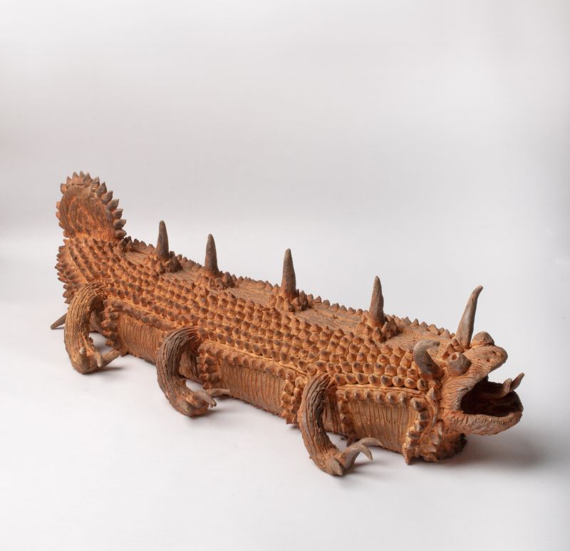 Spiky ceramic creatures and demons, painstakingly crafted by hand ...