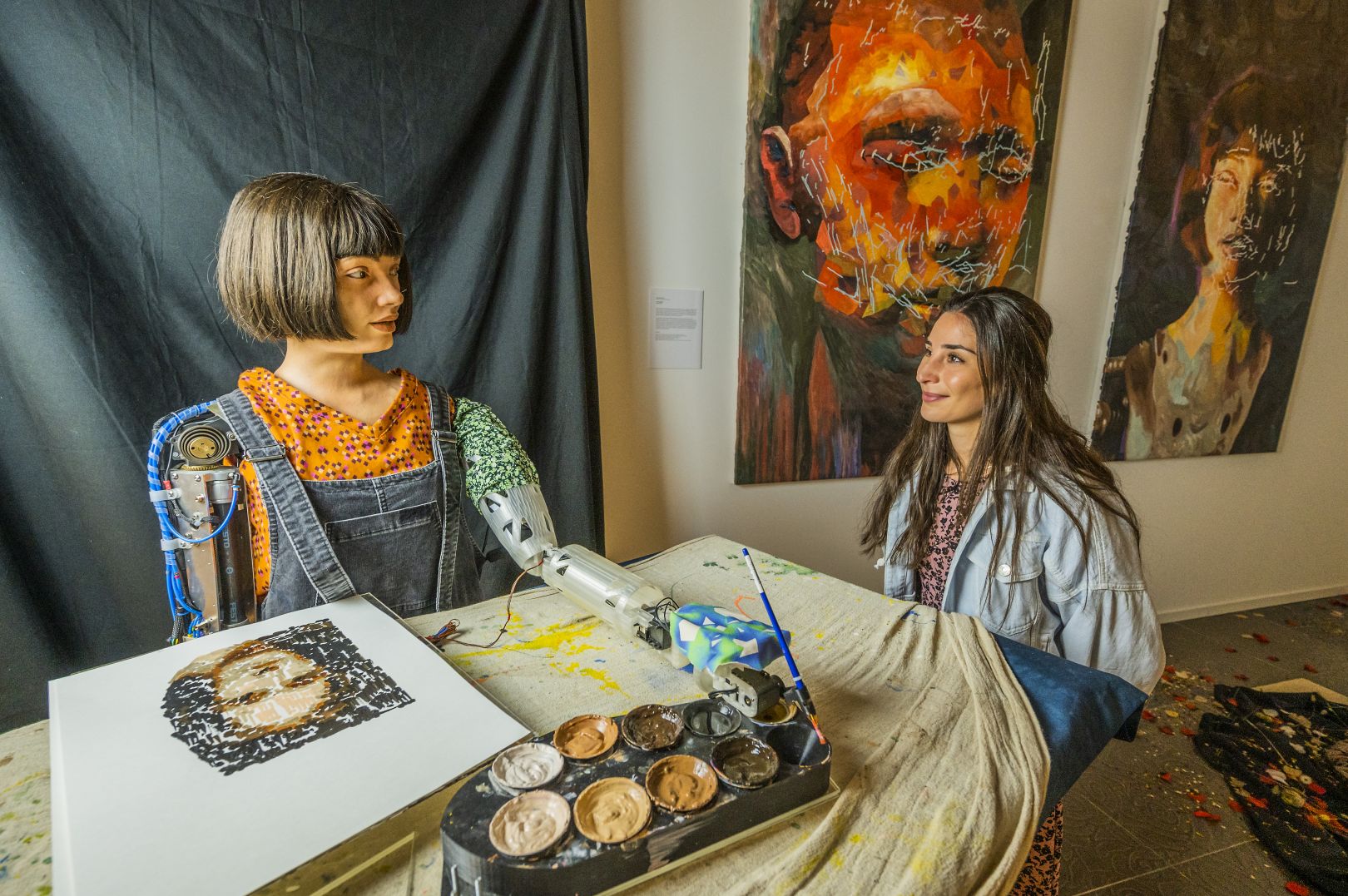 The world's first robot artist reveals amazing new paintings in its ...