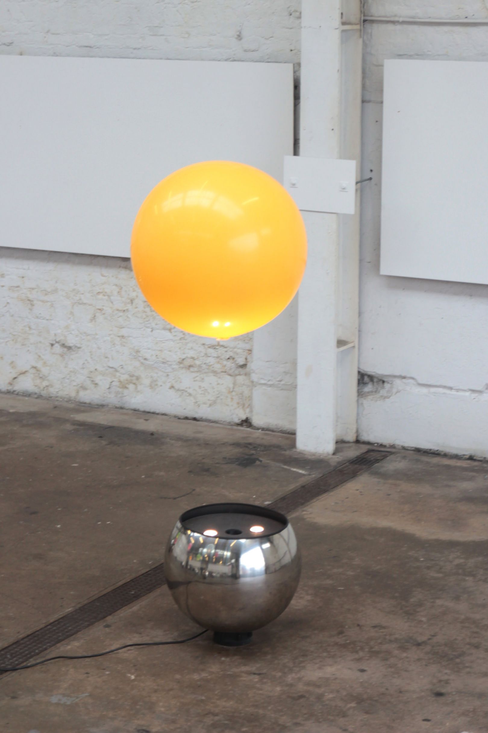 Interactive installation that lets you play with giant colourful orbs ...