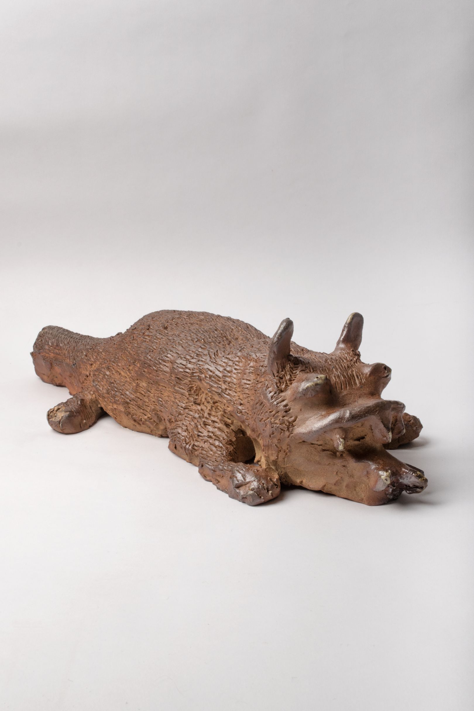 Spiky ceramic creatures and demons, painstakingly crafted by hand ...