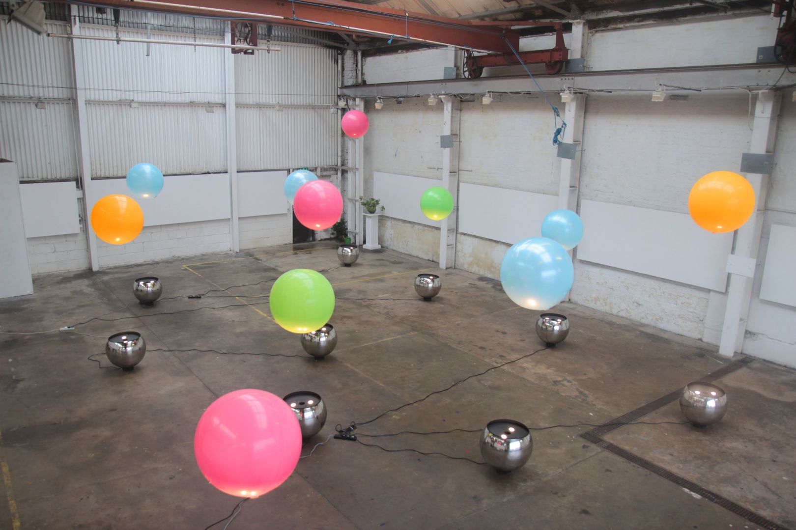 Interactive installation that lets you play with giant colourful orbs ...