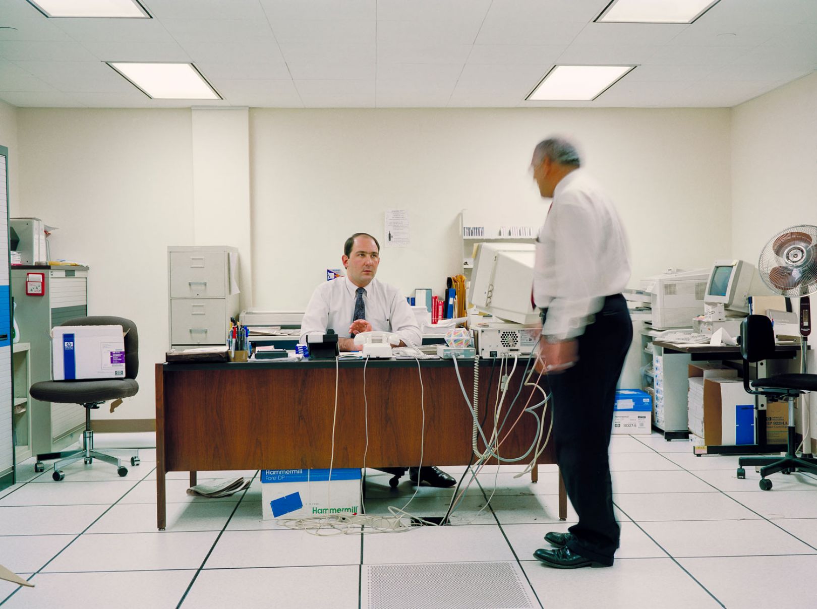 Photographs of office life before iPhones and Wi-Fi reveal not much has ...