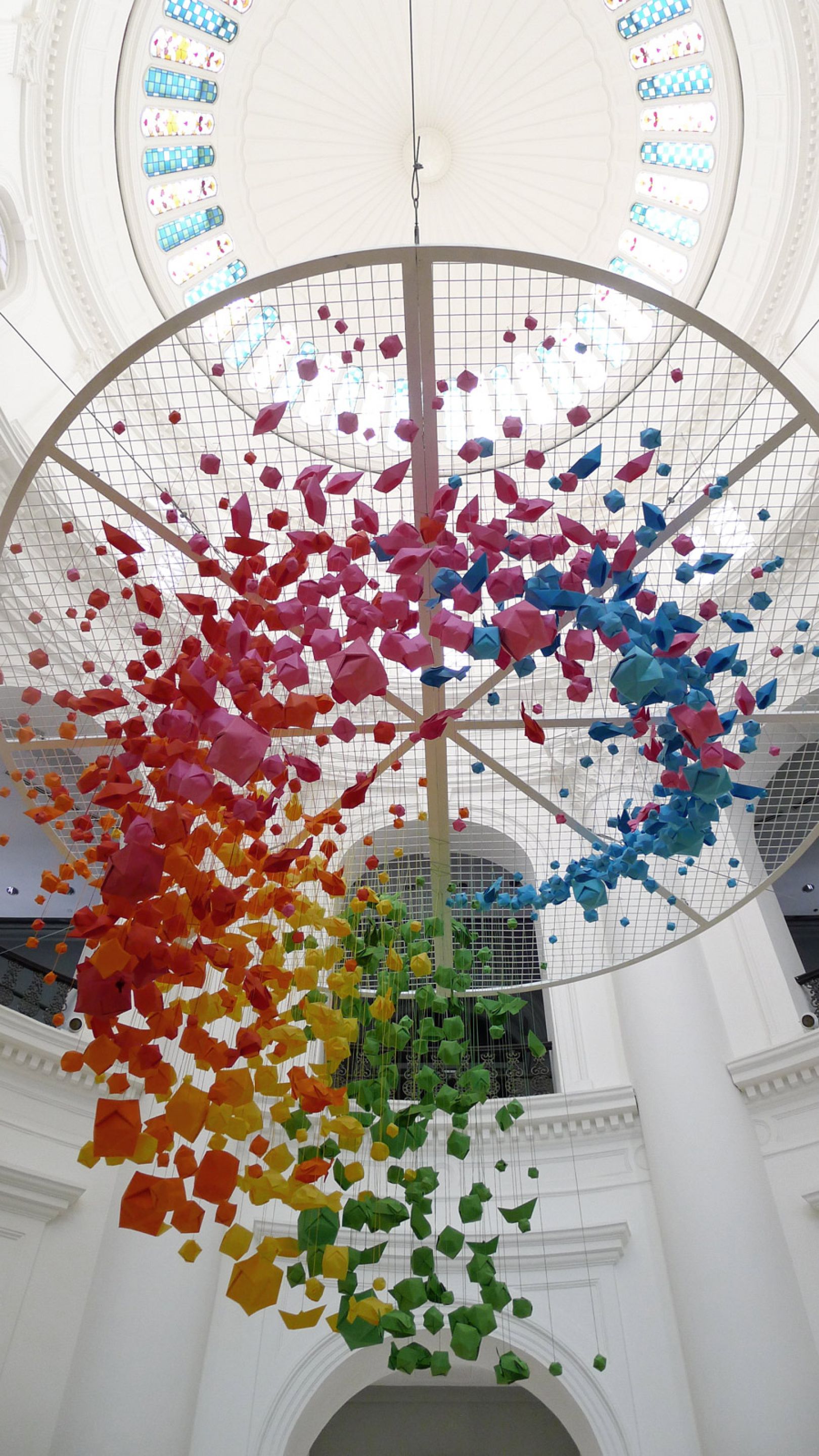 Giant, rainbow hanging installation of 1,000 origami spheres, fish and ...