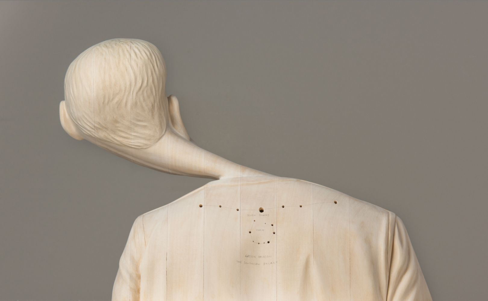 Wooden sculptures of twisted human forms by artist Paul Kaptein ...