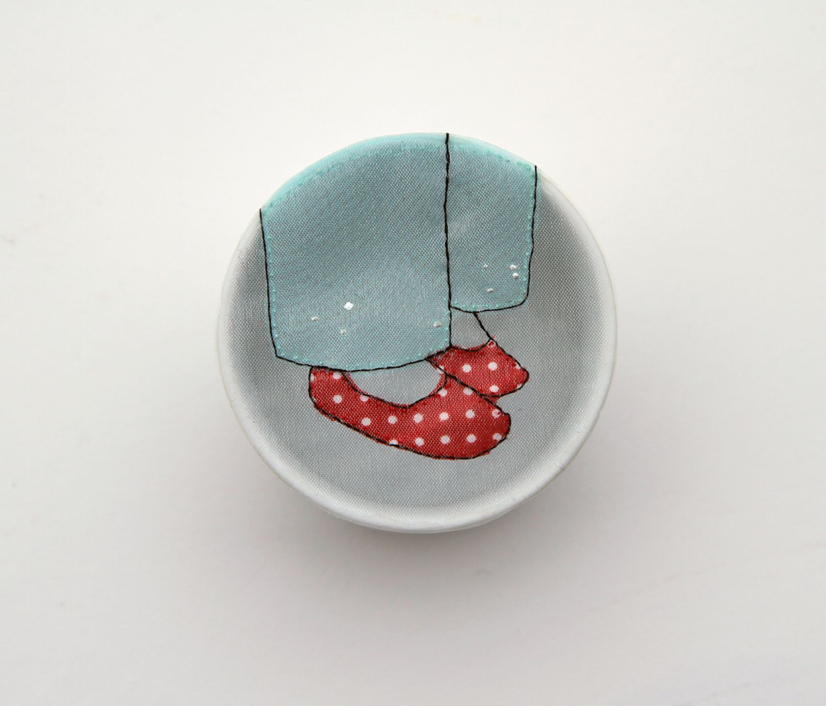 Artist combines ceramics with embroidered artwork to create delicate ...