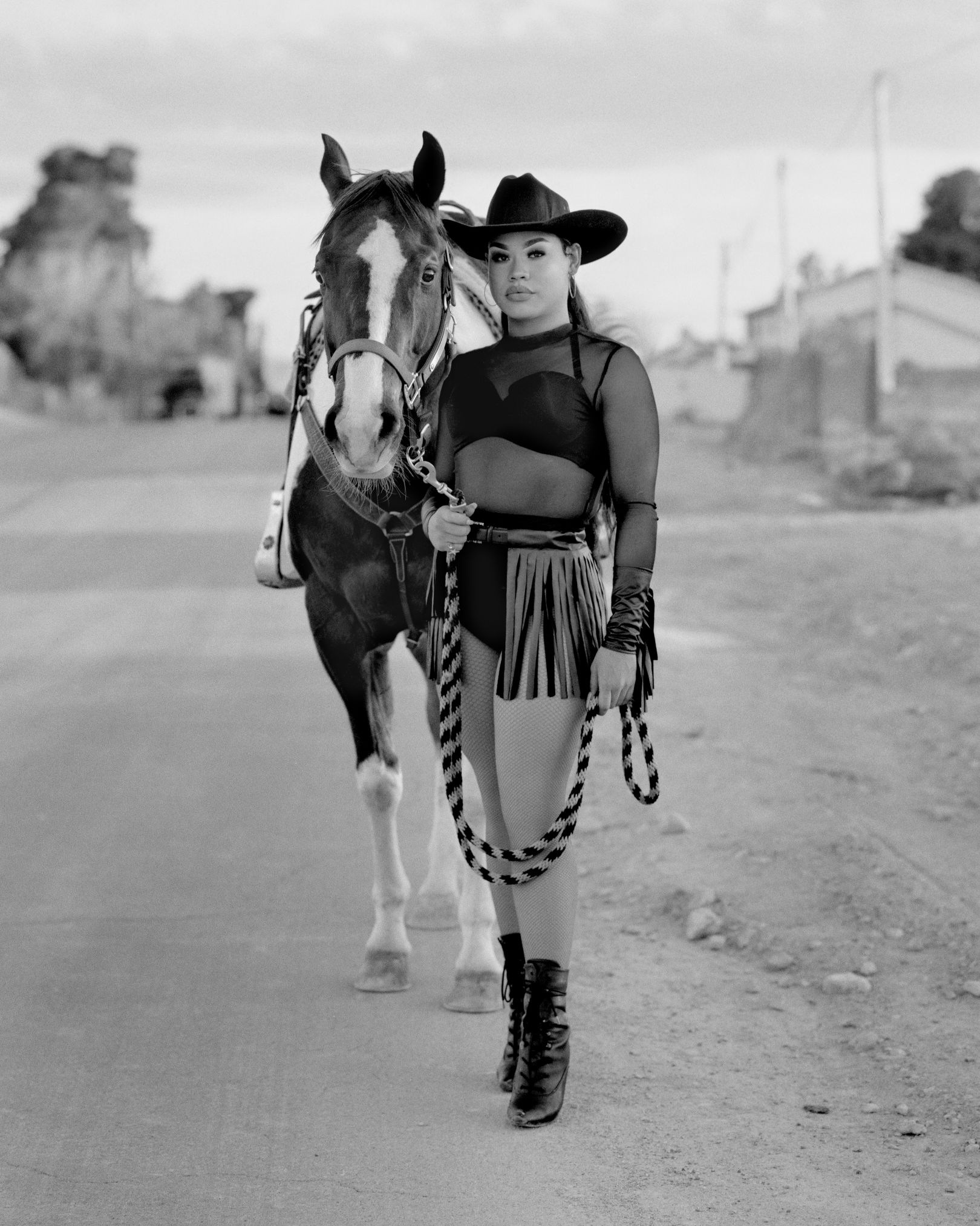 Black and white photographs by Jane Hilton of the 'Drag Queen Cowboys ...