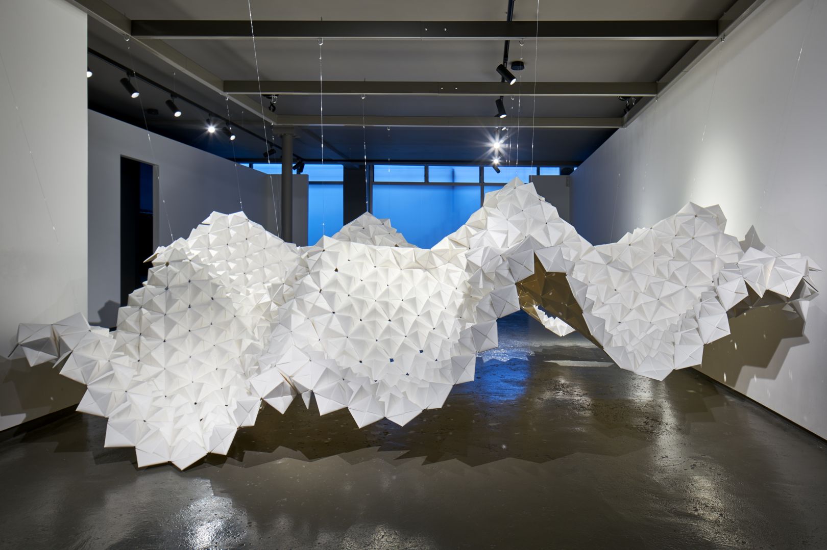Gravity-defying giant hanging sculpture made from thousands of pieces ...