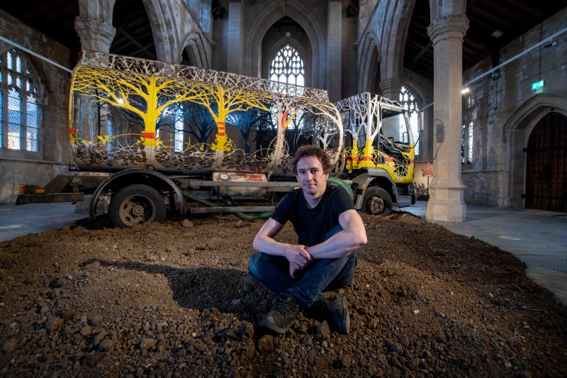 Artist Dan Rawlings delicately hand-cuts an oil tanker to take over a ...