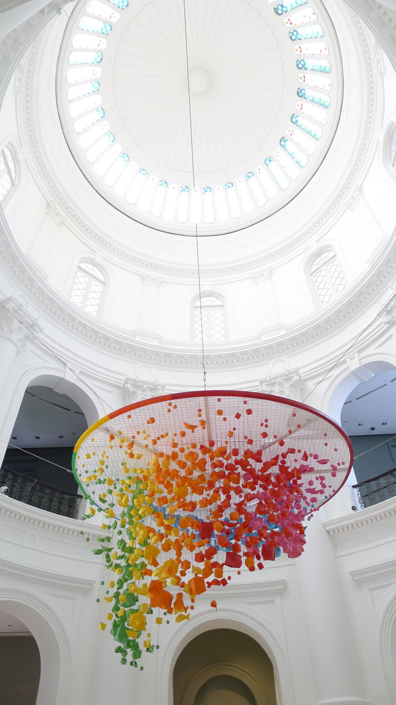 Giant, rainbow hanging installation of 1,000 origami spheres, fish and ...