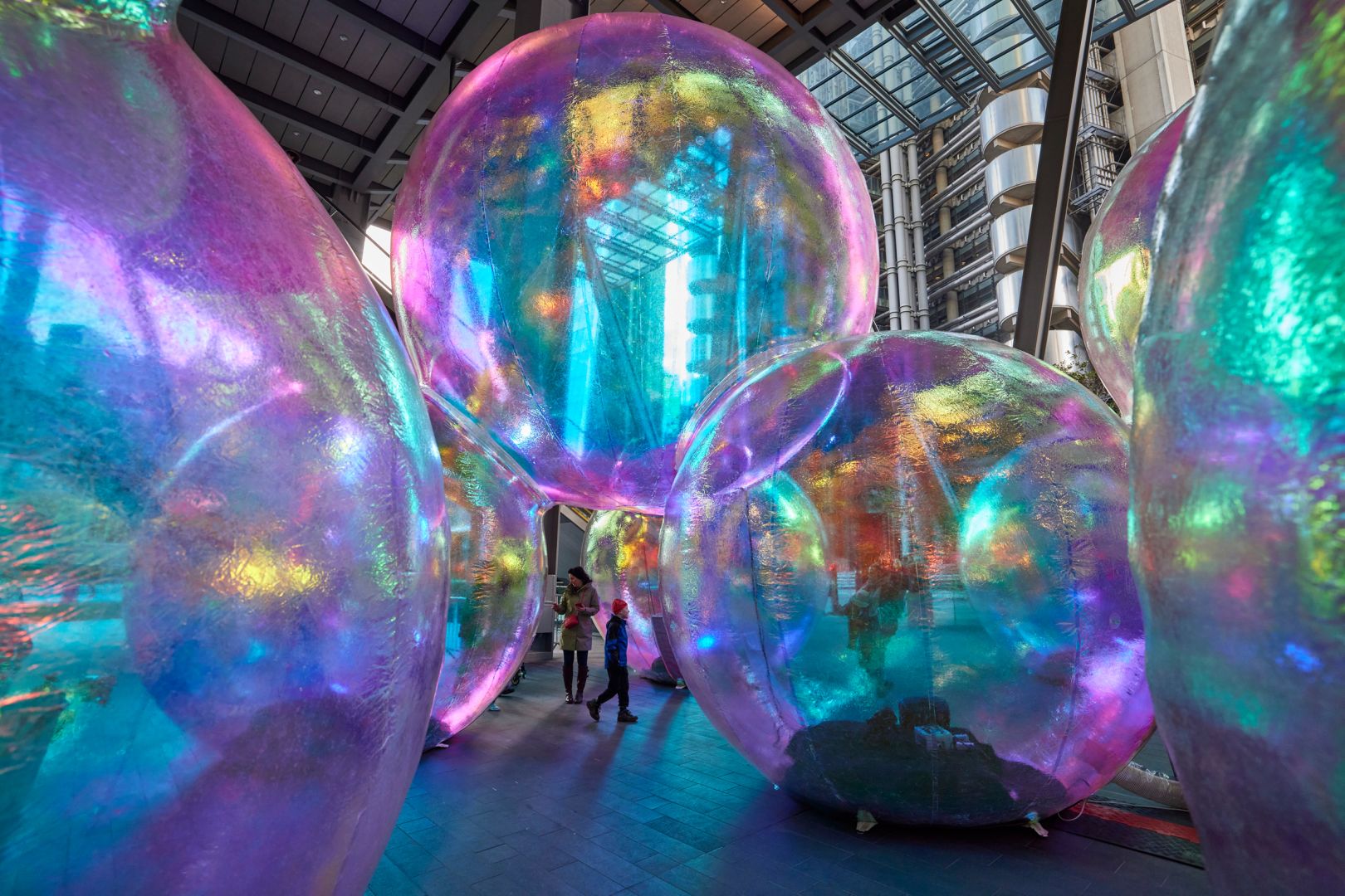 Giant colour-changing bubbles take over The Cheesegrater in London to ...