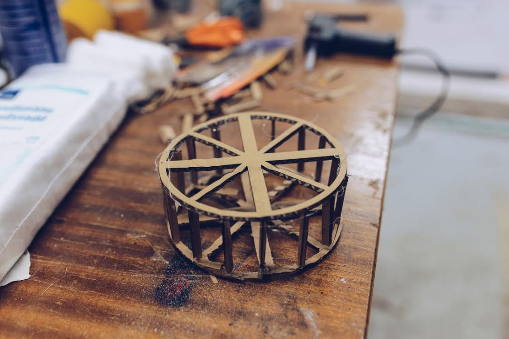 Miniature cardboard models that are photographed to look like the real ...