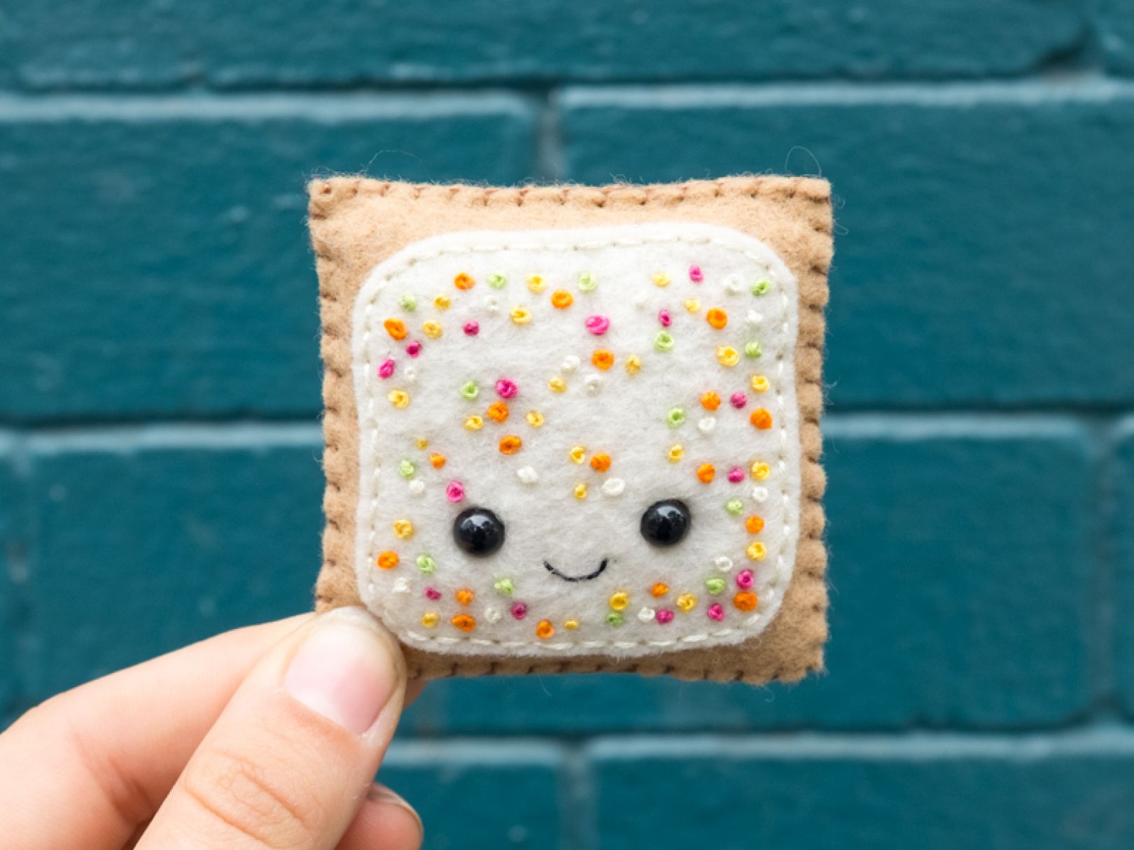 Felt Faces: Artist Becky Margraf crafts 100 little faces for 100 ...