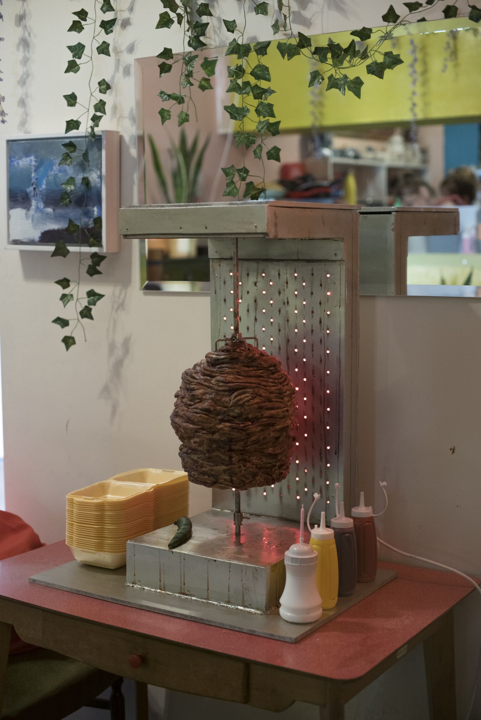 This revolving kebab is actually a life-sized birthday cake and a piece ...